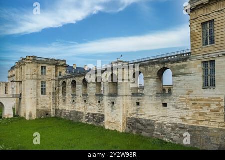 The beautiful medieval castle of Vincennes in France under the blue sky ...