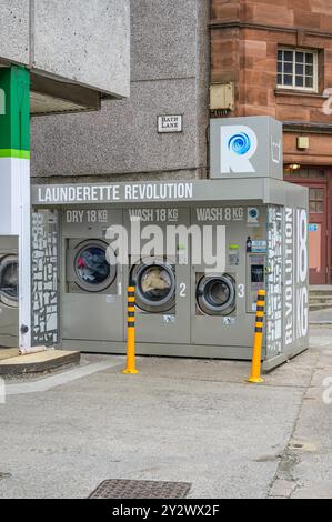 A Wash.ME Revolution Laundry self-service launderette at petrol station ...