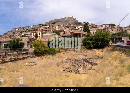 Medieval castle of Molyvos, Lesvos island, Greece and the Greek flag ...
