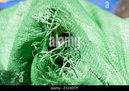 green burlap bag of sand at construction site Stock Photo - Alamy