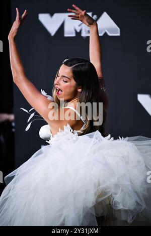 Addison Rae walking on the red carpet at the 2025 CFDA Fashion Awards ...