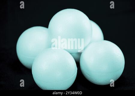 Pyramid of five spheres it frigolite of color blue Stock Photo - Alamy