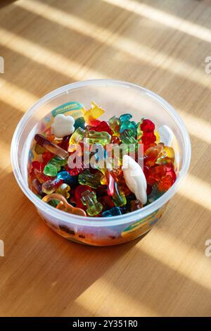 Tasty chewing gums on color background with space for text Stock Photo ...