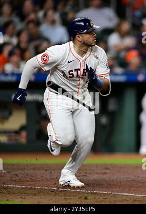 Houston Astros' Yainer Diaz, left, celebrates near first base coach ...
