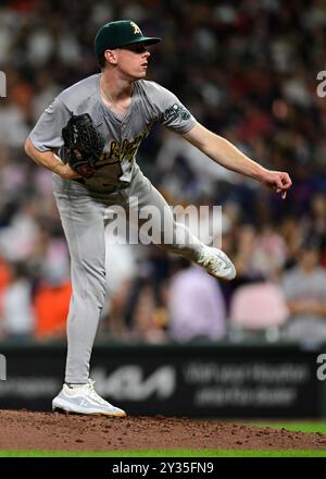 Athletics pitcher JP Sears (38) throws a pitch to a Texas Rangers ...