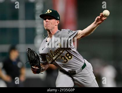 Athletics pitcher JP Sears throws to the Cleveland Guardians during the ...