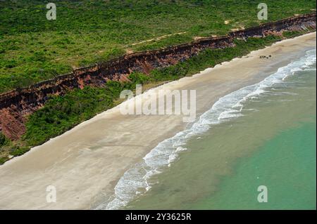 Colorful cliffs typical of the northeastern coast of Brazil. Baía da ...