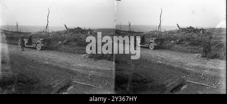 World War 1 British soldiers driving in a car on a road somewhere in ...