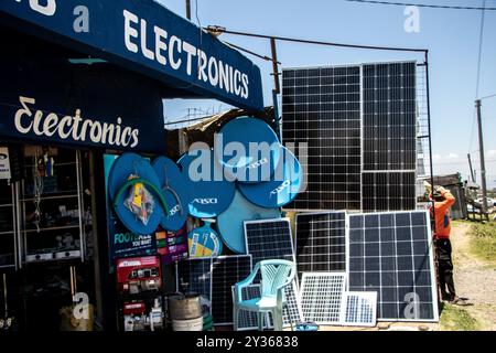 An electronic shop displaying solar panels among other products near ...