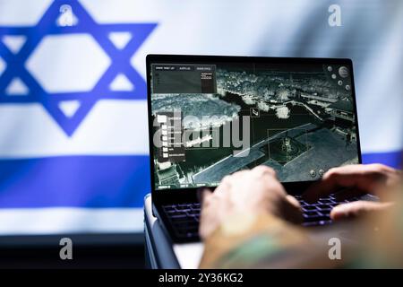 Mossad operative using detection gear analyzing surveillance data ...