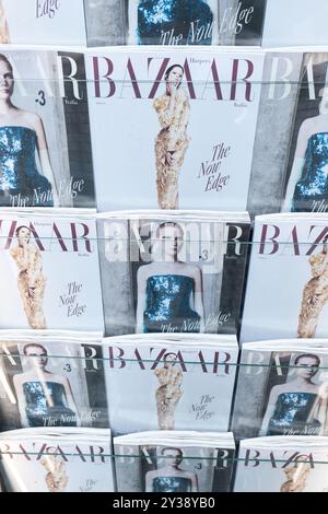 Harper's Bazaar magazines in a newspaper stand in the center of Milan ...