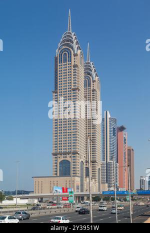 A road and the Skyline with the Al Kazim towers in Dubai, United Arab ...
