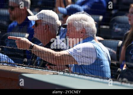 Kansas City Royals owner John Sherman watches a workout during spring ...