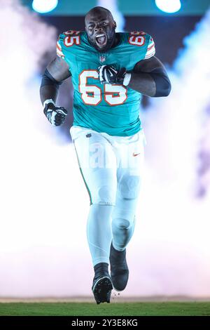 Miami Dolphins guard Robert Jones (65) warms up before an NFL football ...