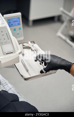 Dentist uses a special syringe Stock Photo - Alamy