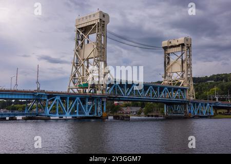A double deck lift bridge crossing a river Stock Photo - Alamy