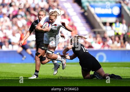 New Zealand's Renee Holmes (right) is tackled during the Women's Rugby ...