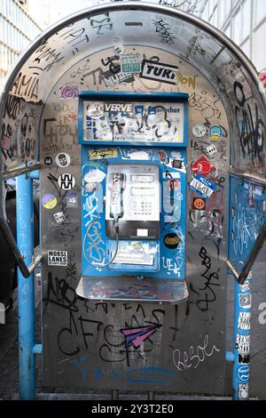 Public Phone Booth covered with stickers and graffitt in Berlin Germany ...
