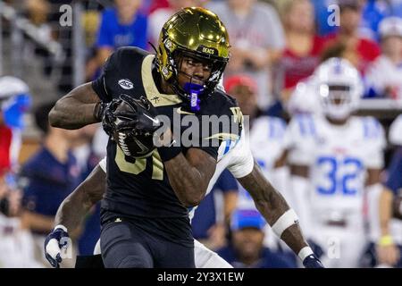 Mississippi wide receiver Deuce Alexander (11) runs down the field with ...