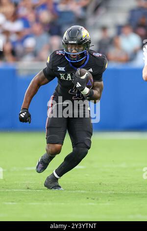 Kansas running back Devin Neal speaks during a press conference at the ...