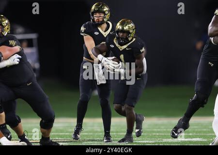 Wake Forest running back Demond Claiborne (1) gets past Georgia Tech ...