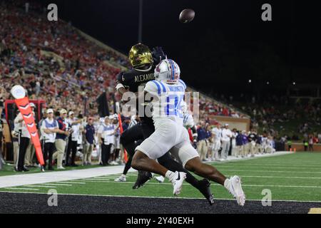 Mississippi wide receiver Deuce Alexander (11) is tackled by Georgia ...