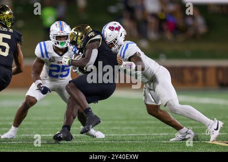 Wake Forest running back Demond Claiborne (1) gets past Georgia Tech ...