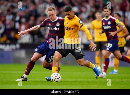 Wolverhampton Wanderers' Andre, Newcastle United's Bruno Guimaraes and ...