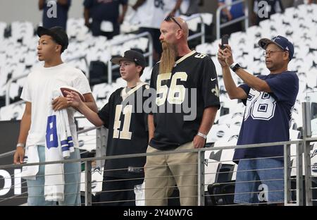 Dallas Cowboys fans stand for the national anthem before an NFL ...