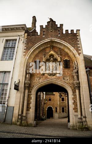 Gothic entrance gate to Gruuthuse museum in Bruges, Belgium Stock Photo ...