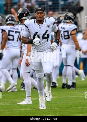 Jacksonville Jaguars defensive end Travon Walker (44) rushes around the ...