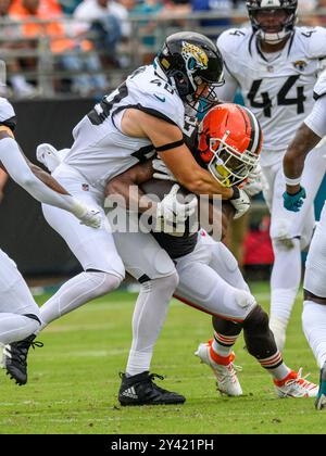 Cleveland Browns running back D'Onta Foreman, front, center, is stopped ...