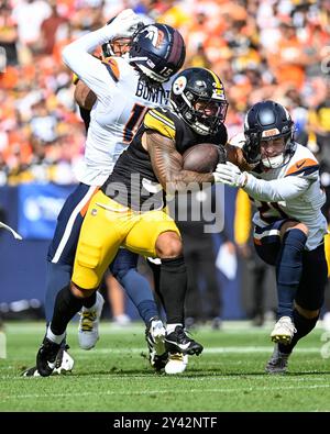 Denver Broncos cornerback Riley Moss (21) breaks up a pass intended by ...