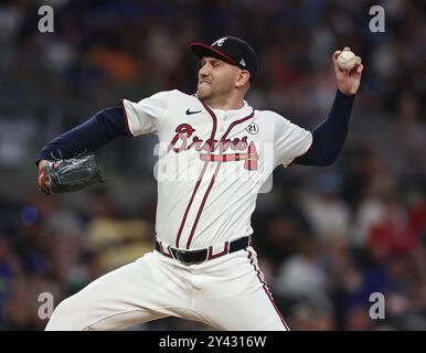 Atlanta Braves pitcher Dylan Lee throws during the seventh inning of a ...
