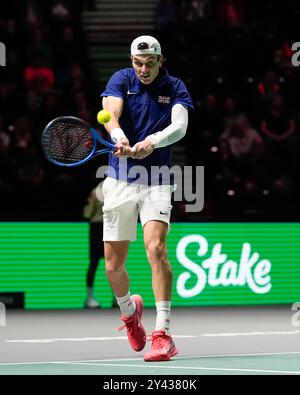 Jack Draper of Britain plays a backhand return to Mariano Navone of ...