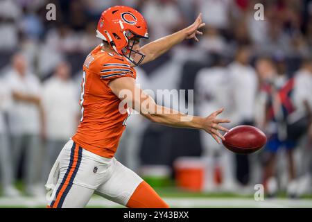 Chicago Bears punter Tory Taylor moves across the field during the ...