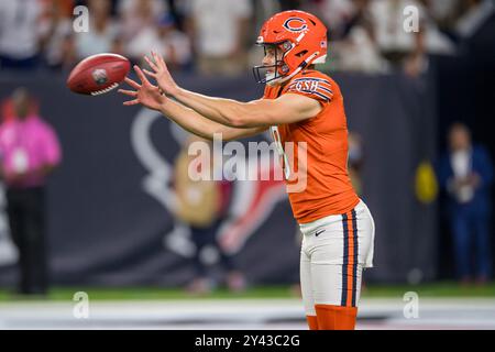 Chicago Bears punter Tory Taylor (19) punts the ball during an NFL ...