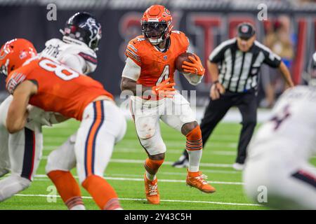 Chicago Bears running back D'Andre Swift (4) is tackled by Minnesota Vikings cornerback Isaiah ...