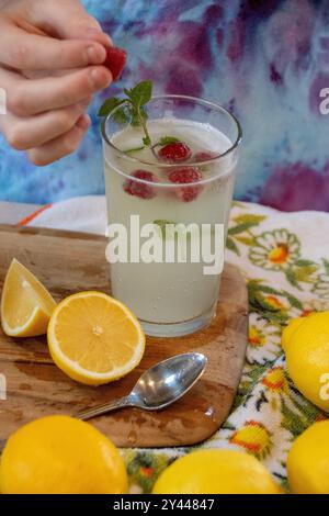 Fresh homemade lemonade with mint and raspberries Stock Photo - Alamy