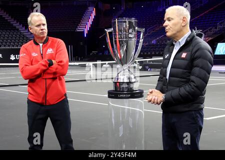 Team World vice captain Patrick Rafter, left, walks with Rod Laver ...