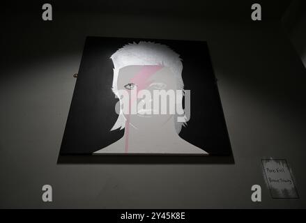 a lad insane by artist pure evil Stock Photo - Alamy