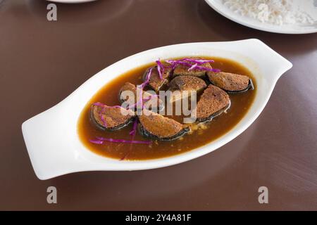 Vegan tofu fish fillets in gravy Stock Photo - Alamy