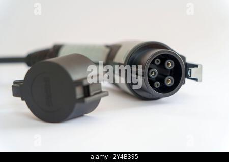 Close up of a female Type 1 j1772 connector on an EV charging cable ...