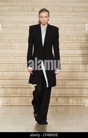 Model Evie Harris walks on the runway at the Stella McCartney fashion ...