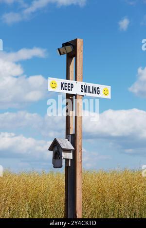 Keep Smiling sign, near Watrous SK Canada Stock Photo - Alamy