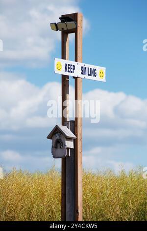 Keep Smiling sign, near Watrous SK Canada Stock Photo - Alamy