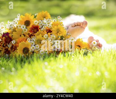 bare feet on spring grass and flowers Stock Photo - Alamy