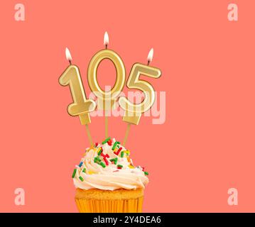 birthday cake with number 105 - cupcake on orange background with ...
