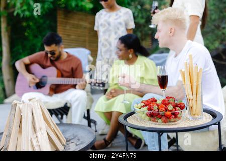 a guitar and good wine Stock Photo - Alamy