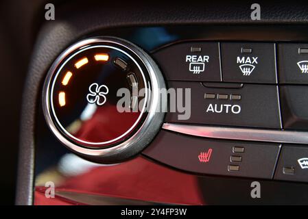 Buttons for activating the air conditioners on the dashboard passenger ...